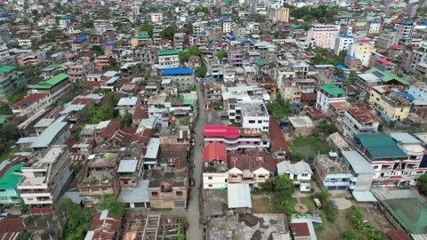 Aerial Shot Of Slums House With Mountain... | Stock Video | Pond5