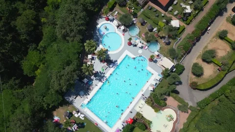 Aerial Shot of Swimming Pool at Weekend ... | Stock Video | Pond5