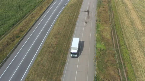 Aerial shot of truck with cargo trailer ... | Stock Video | Pond5