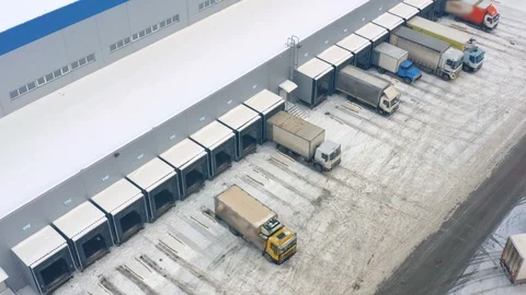 Aerial side view of a logistics loading ... | Stock Video | Pond5