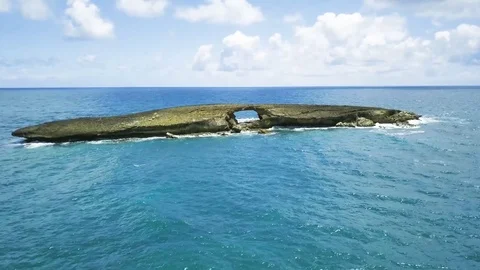 Aerial: Small Island off Laie Hawaii wit... | Stock Video | Pond5
