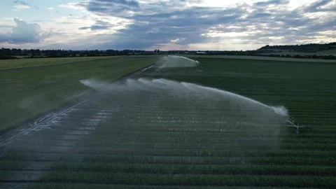 Aerial Sprinkler Water Irrigation Farm C... | Stock Video | Pond5