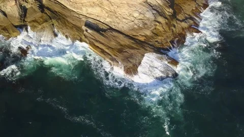 Aerial static shot of sea waves breaking... | Stock Video | Pond5
