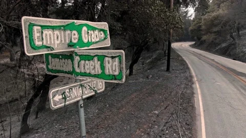 Aerial: Street sign melted from wildfire... | Stock Video | Pond5