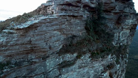 Aerial-Stunning Vertical Cliff Wall and ... | Stock Video | Pond5