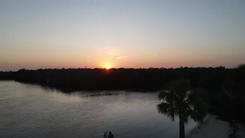 aerial sunset scan of horizon at Cockroa... | Stock Video | Pond5