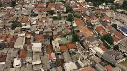 Aerial tilt up of crowded slum district ... | Stock Video | Pond5
