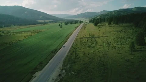Aerial tilt view of an asphalt road in r... | Stock Video | Pond5