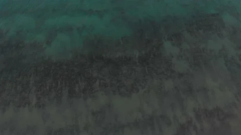 Aerial tilt-up view of Matadouro beach a... | Stock Video | Pond5