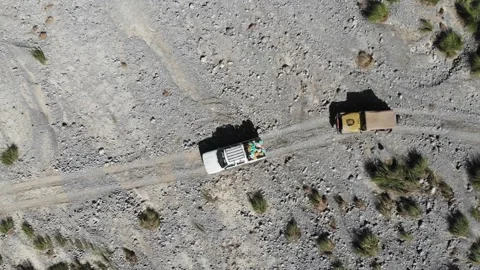 Aerial top angle shot of car driving in ... | Stock Video | Pond5