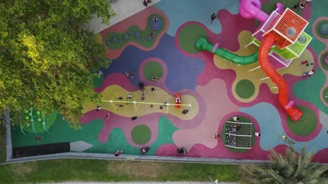 Aerial top down of kids playing games at... | Stock Video | Pond5
