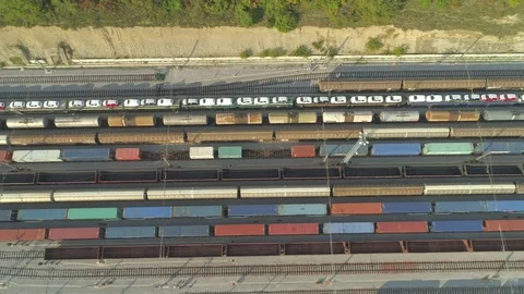 AERIAL TOP DOWN: Loaded freight train le... | Stock Video | Pond5