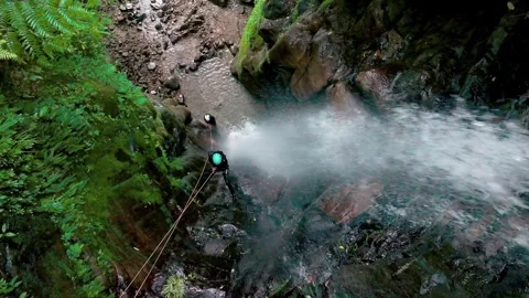 Aerial top down shot of falling waterfal... | Stock Video | Pond5