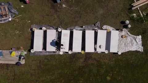 Aerial top down shot showing male worker... | Stock Video | Pond5