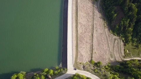 Aerial Top down Show of road splitting w... | Stock Video | Pond5