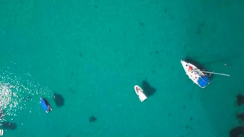 Aerial - Top down view of anchored boats... | Stock Video | Pond5