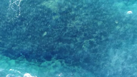 Aerial top down view of azure blue ocean... | Stock Video | Pond5