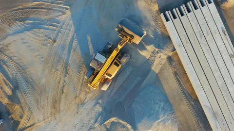 Aerial top down view of the backhoe load... | Stock Video | Pond5