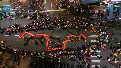 Aerial top down view dragon dance perfor... | Stock Video | Pond5