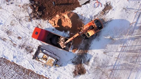 aerial top down view. Excavator loads du... | Stock Video | Pond5
