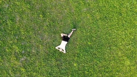 Aerial top down view of happy young man ... | Stock Video | Pond5