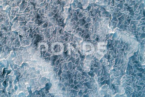 Aerial top down view of ice surface. Frozen sea surface texture Stock ...