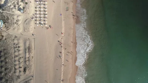 Aerial top down view of the Praia dos Tr... | Stock Video | Pond5