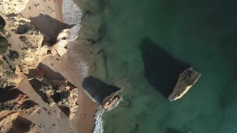 Aerial top down view of the Praia dos Tr... | Stock Video | Pond5