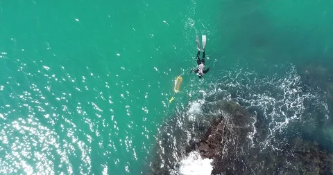 Aerial top down view of scuba diver with... | Stock Video | Pond5