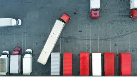 Aerial top down view of a semi-trailer t... | Stock Video | Pond5