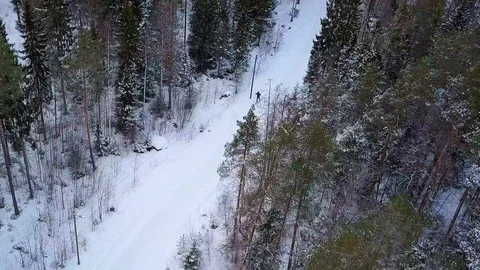 Aerial, top down view, skier in winter f... | Stock Video | Pond5