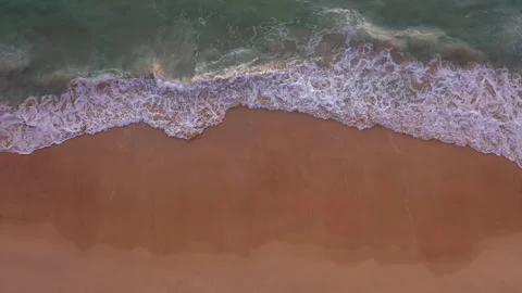 aerial top view blue waves crashing on t... | Stock Video | Pond5