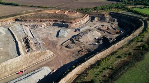 Aerial top view of excavator loading lor... | Stock Video | Pond5