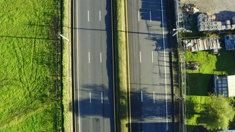 Aerial top view of a four lane highway w... | Stock Video | Pond5