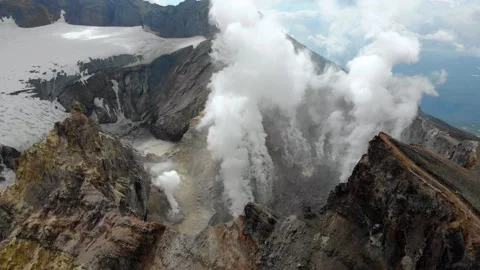 Aerial top view of fumaroles in crater o... | Stock Video | Pond5
