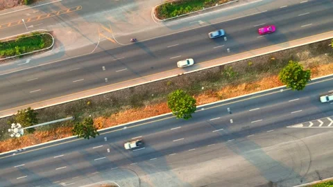 Aerial top view of the highway at sunset | Stock Video | Pond5