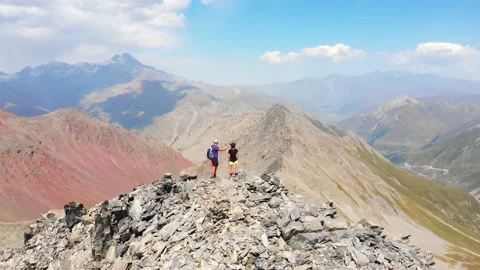 Aerial top view Hikers couple hug after ... | Stock Video | Pond5