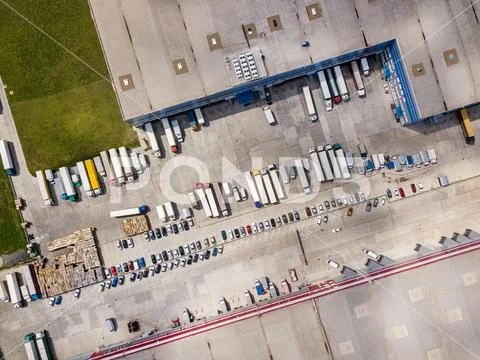 Aerial top view of the large logistics park with warehouse, loading hub ...