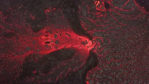 Aerial top view of a lava river flowing ... | Stock Video | Pond5