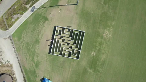 Aerial Top View Of People In Labyrinth O... | Stock Video | Pond5