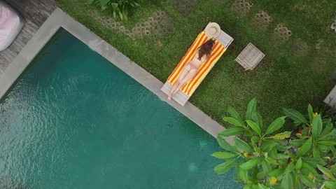 Aerial top view of slim young woman in b... | Stock Video | Pond5