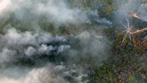 Aerial top view of smoke from burning ga... | Stock Video | Pond5