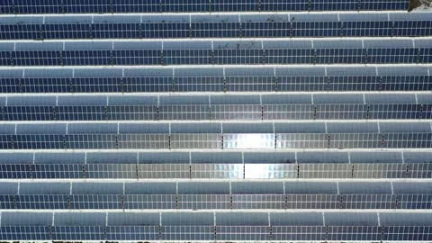 AERIAL. Top view of solar plant and wind... | Stock Video | Pond5