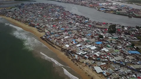 Aerial Tracking Above Massive Slum on Be... | Stock Video | Pond5