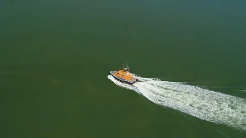 Aerial tracking shot of a RNLI Lifeboat ... | Stock Video | Pond5