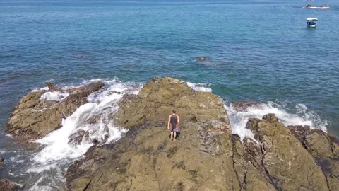 Aerial Tracking Shot Of A Young Man Navi... | Stock Video | Pond5