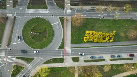 Aerial - traffic roundabout with pedestr... | Stock Video | Pond5