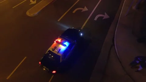 Aerial view above police car with sirens... | Stock Video | Pond5