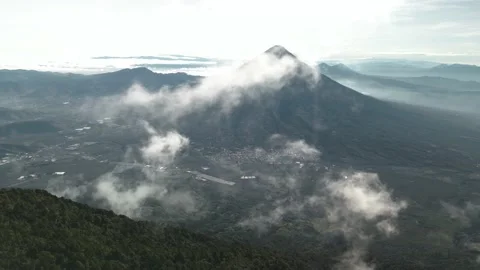 Aerial view of the Agua Volcano covered ... | Stock Video | Pond5