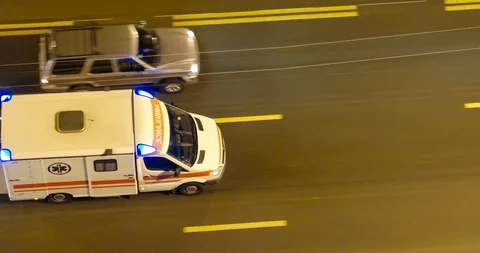 Aerial view of an ambulance driving at n... | Stock Video | Pond5